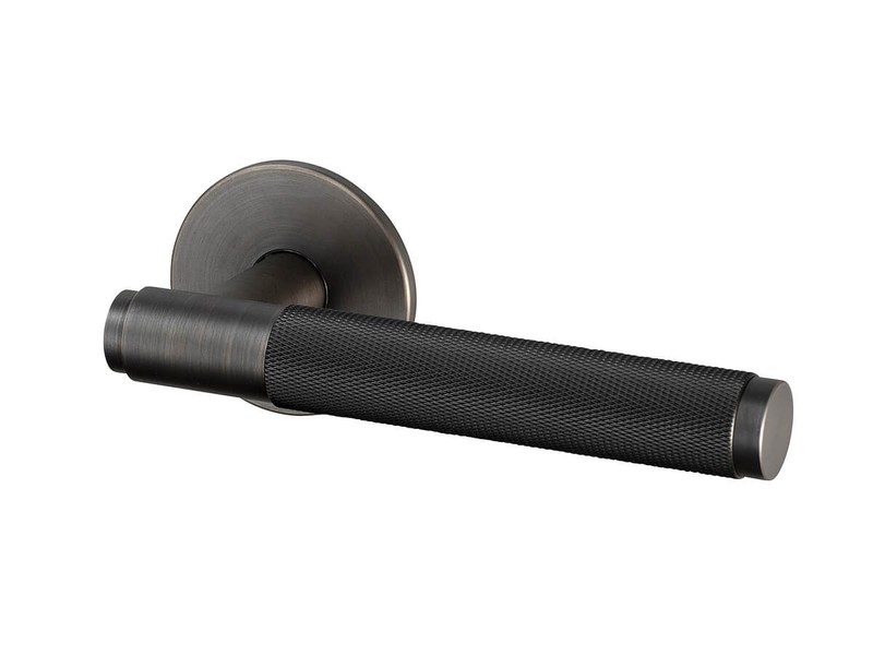 Buy the Buster + Punch Door Lever Handle - Sprung at nest.co.uk